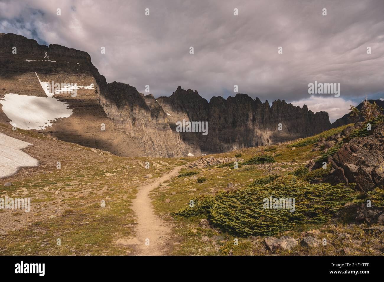 Moody Clouds Over Mountain Range from Piegan Pass in Glacier National ...