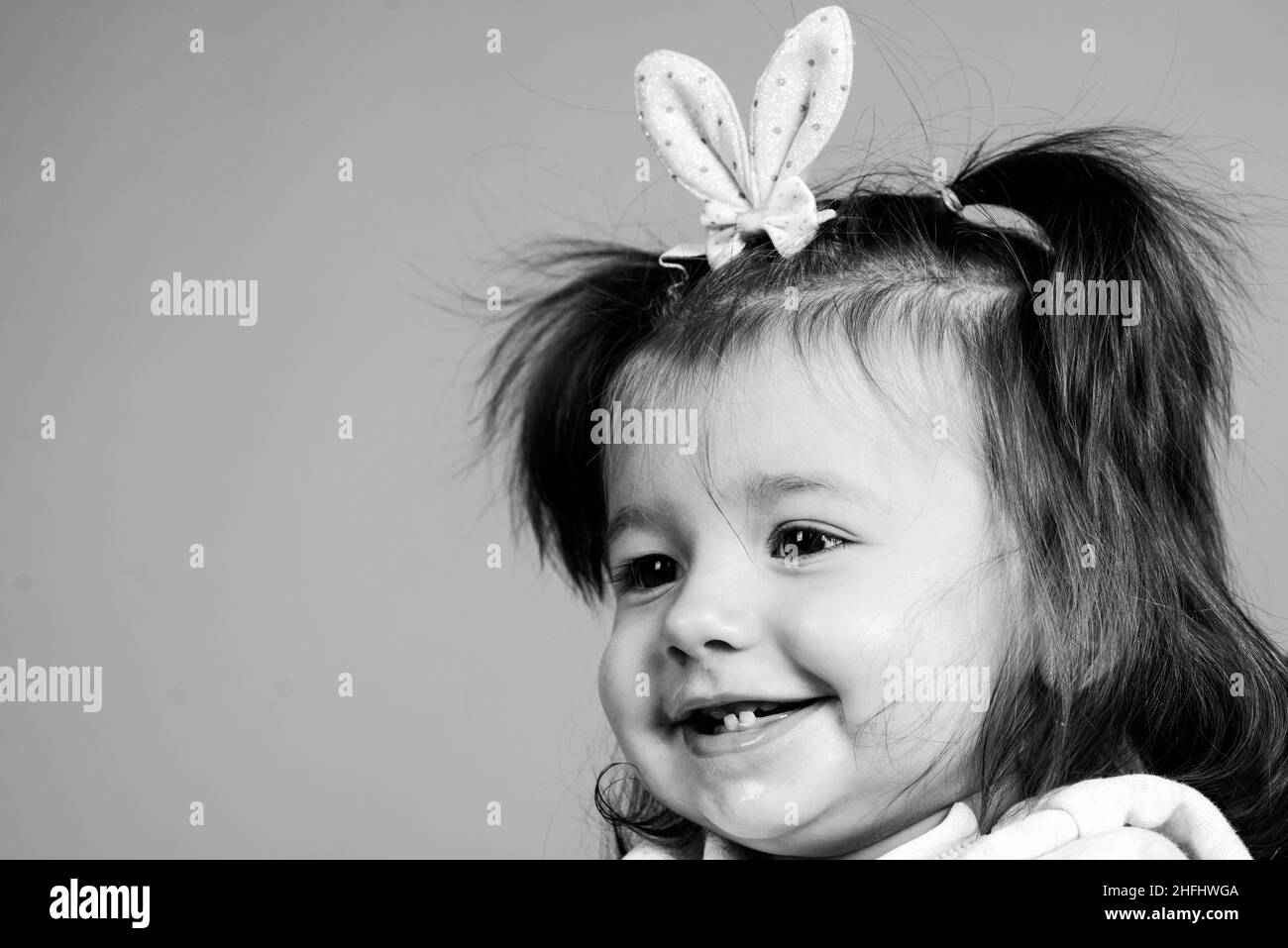 Bunny ears hands Black and White Stock Photos & Images - Alamy