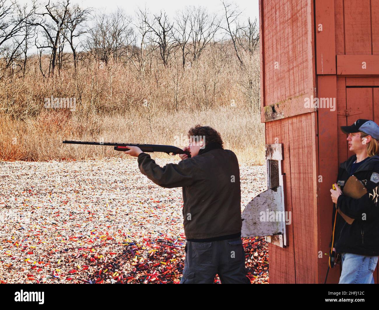 Young man Skeet Shooting - Skeet shooting is a recreational and ...
