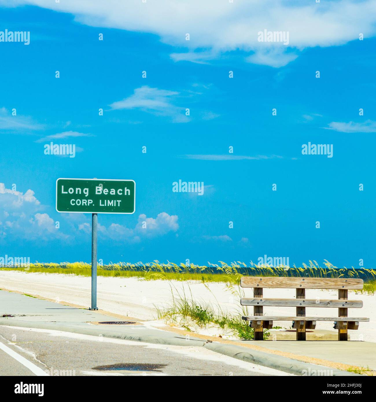 street sign Long Beach at highway 90 in Pass Christian Stock Photo - Alamy