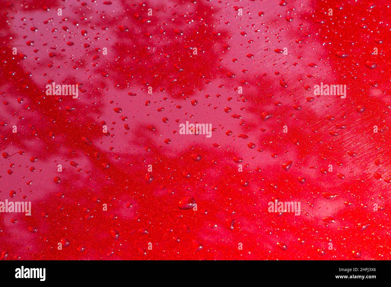 drop of water at a red color metal of a car Stock Photo - Alamy