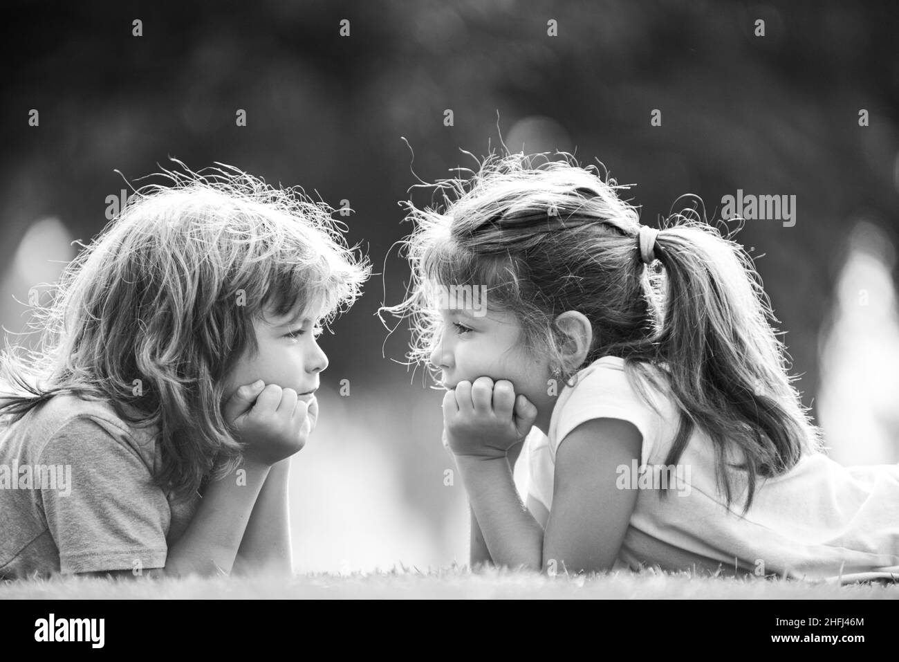 Cute little brother laughing sister Black and White Stock Photos ...