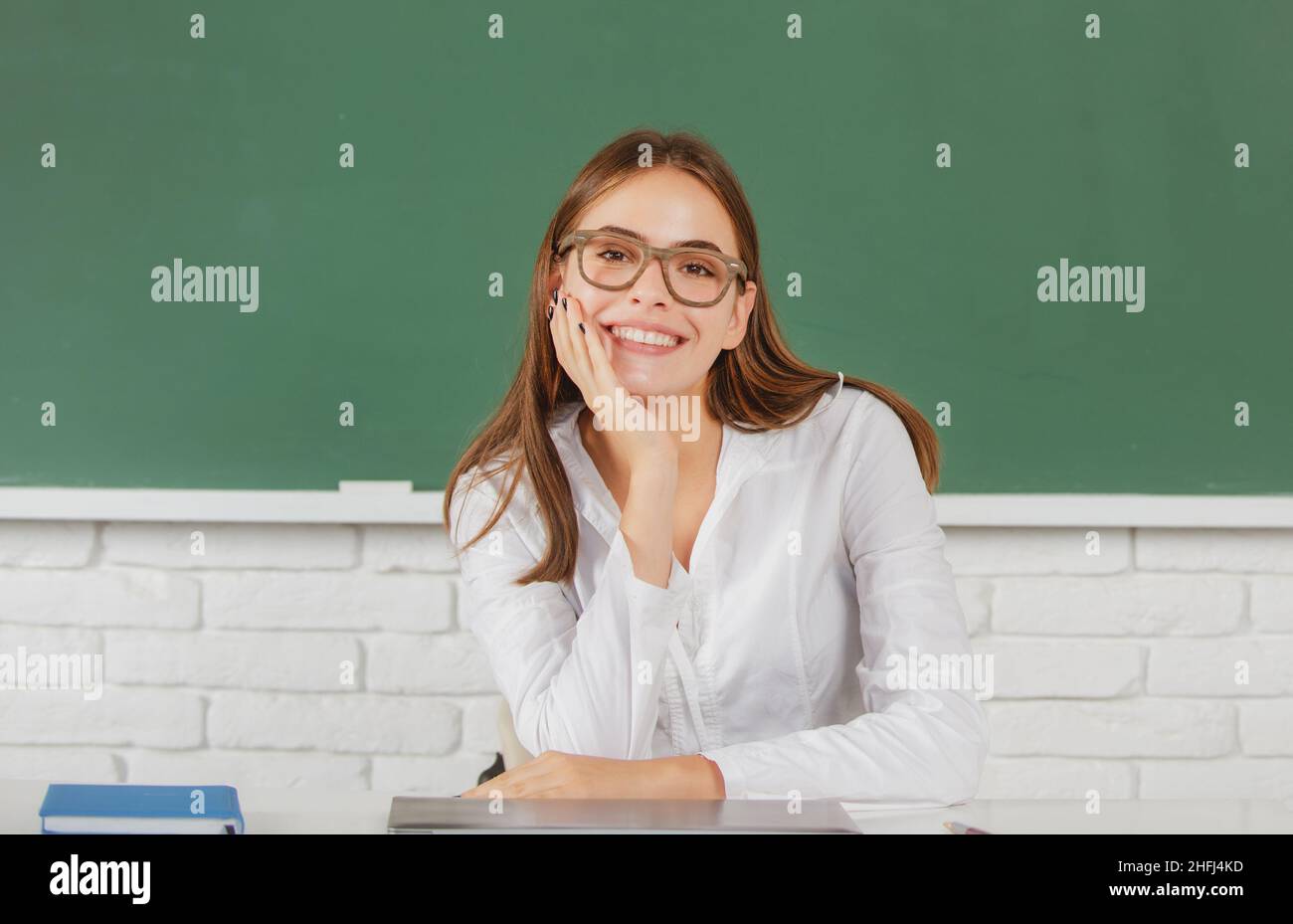 Portrait of female university student study lesson at school or ...