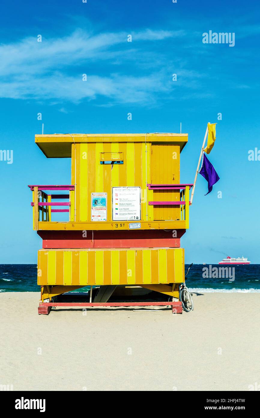 colorful lifeguard tower in Miami Beach, Florida with blue sky and ...