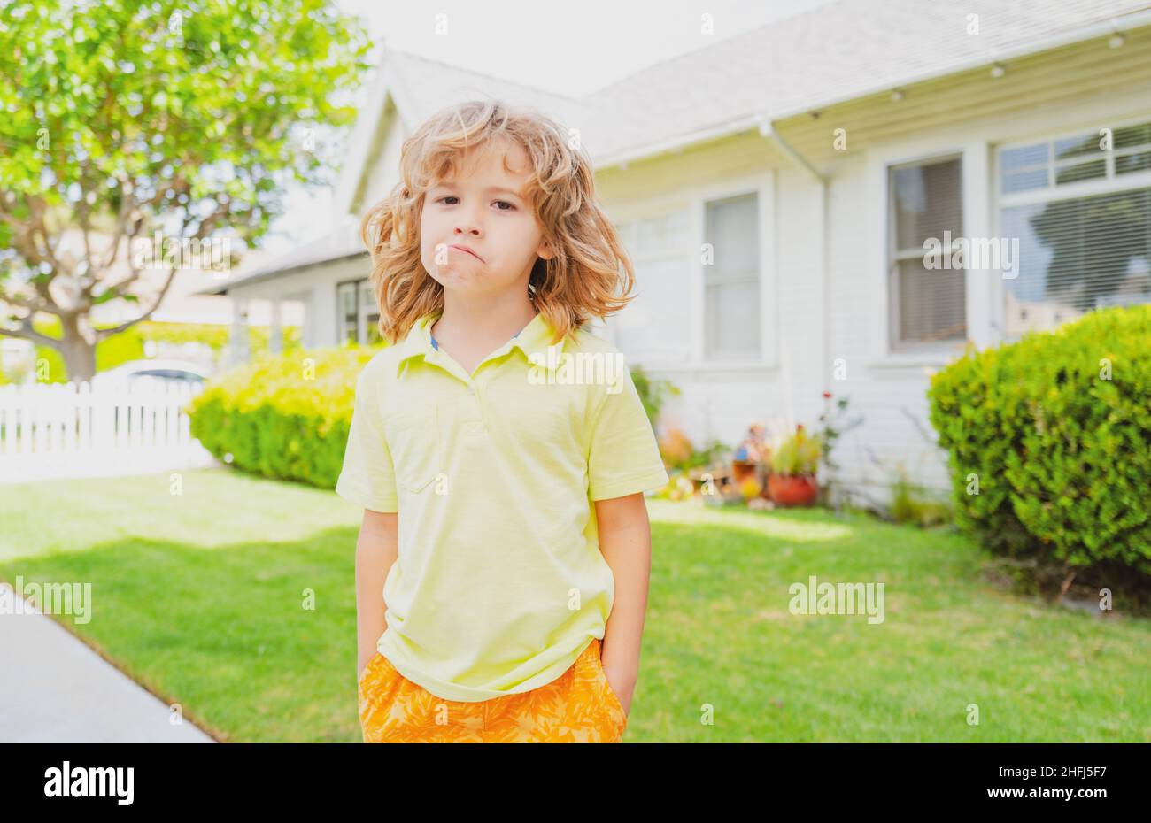 Kids funny face. Happy kid having fun and making fun faces outdoors ...