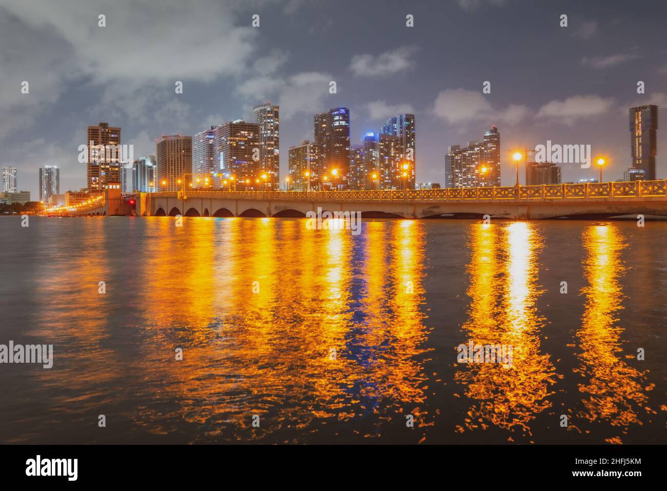 Miami at sunset. Miami Florida, colorful skyline of Macarthur causeway ...