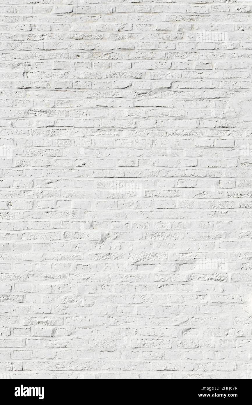 white brick wall gives a harmonic pattern Stock Photo - Alamy