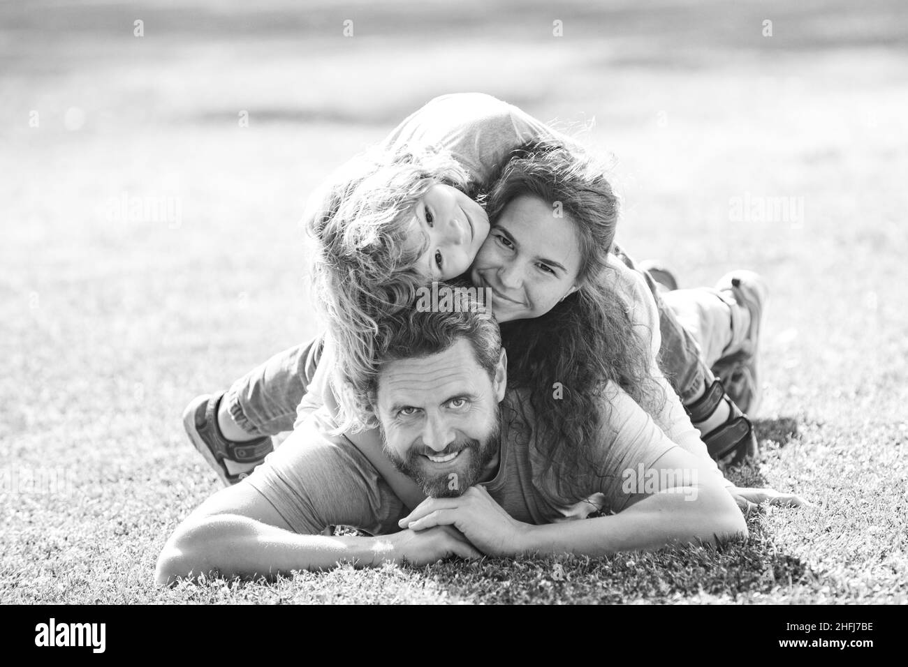 Cuddling her son in nature Black and White Stock Photos & Images - Alamy