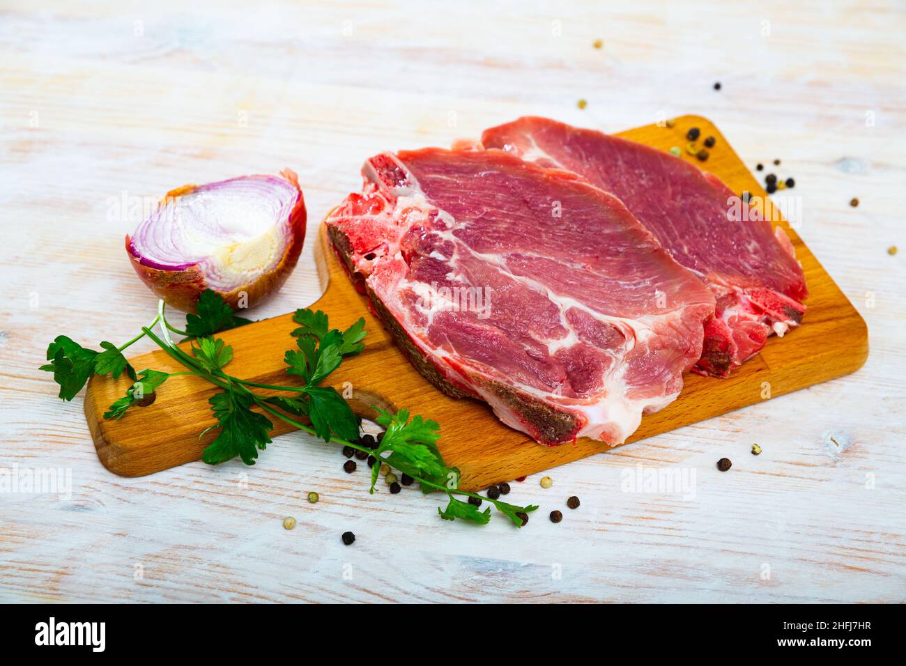 Two pork sirloin chops hi-res stock photography and images - Alamy
