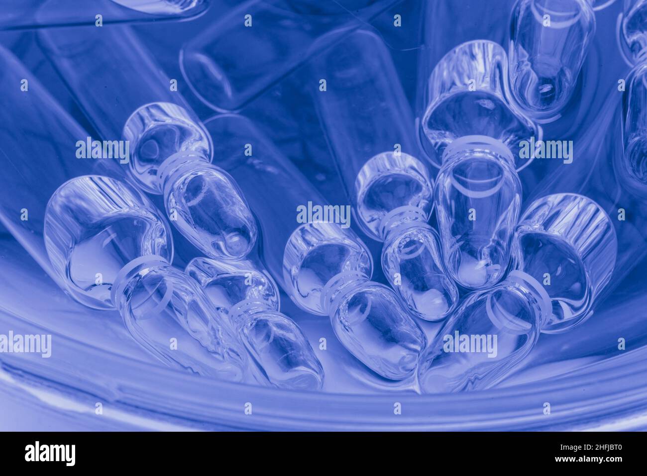 Glass medical ampoule vial for injection. Medicine is liquid sodium ...