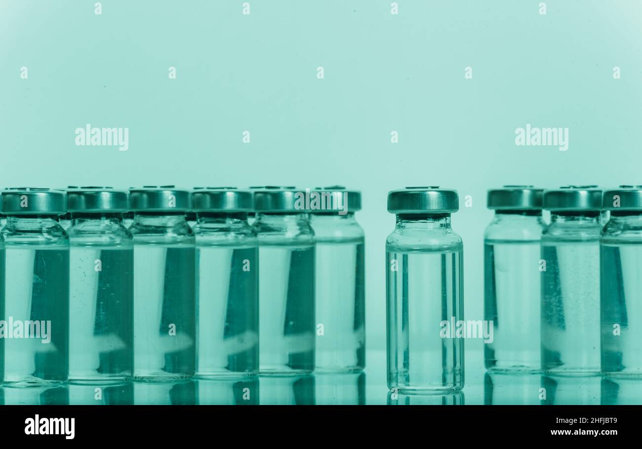 Glass medical ampoule vial for injection. Medicine is liquid sodium ...