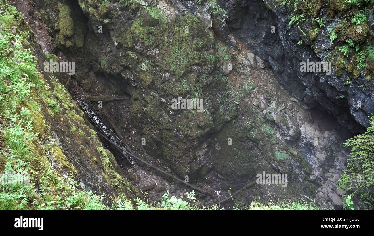 Top view of the the dangerous trail inside the deep gorge. Aerial of ...