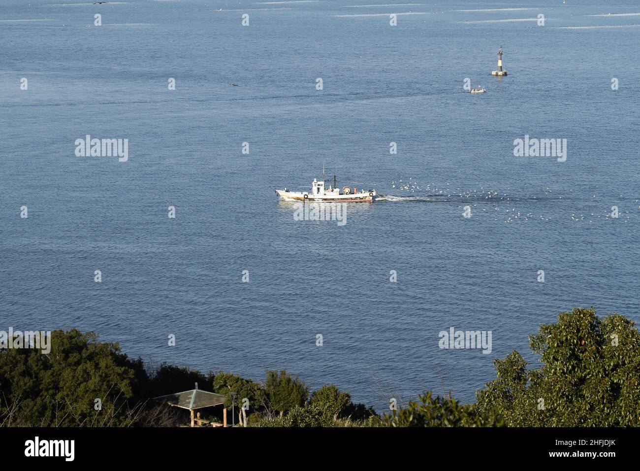 Minamichita, Aichi, Japan, 2022/15/01 , Fisherman boat returning in ...