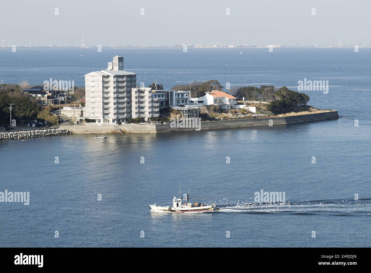 Minamichita, Aichi, Japan, 2022/15/01 , Fisherman boat returning in ...