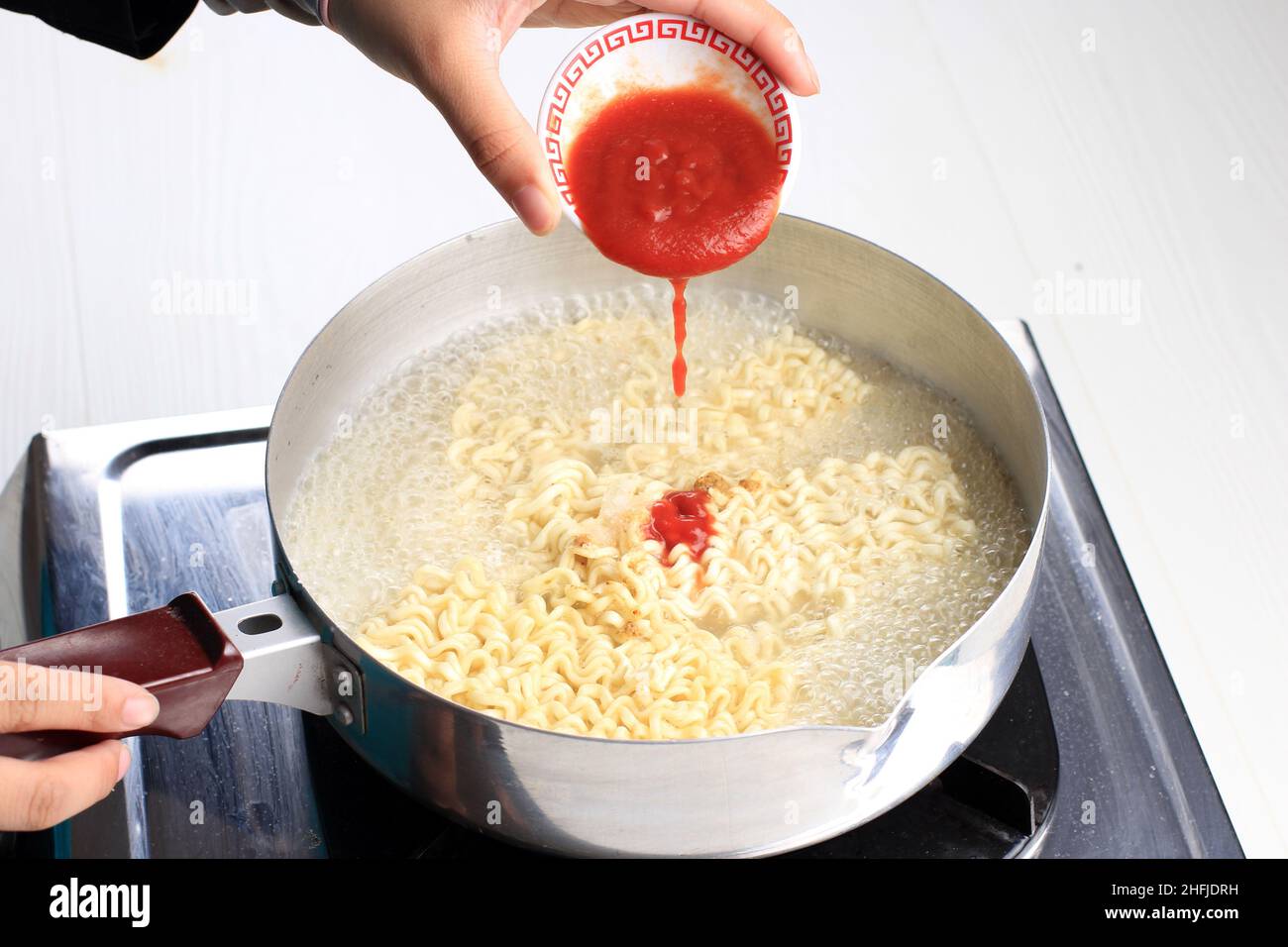 Pour Red Spicy Paste to the Boiled Instant Korean Ramyeon, Cooking ...