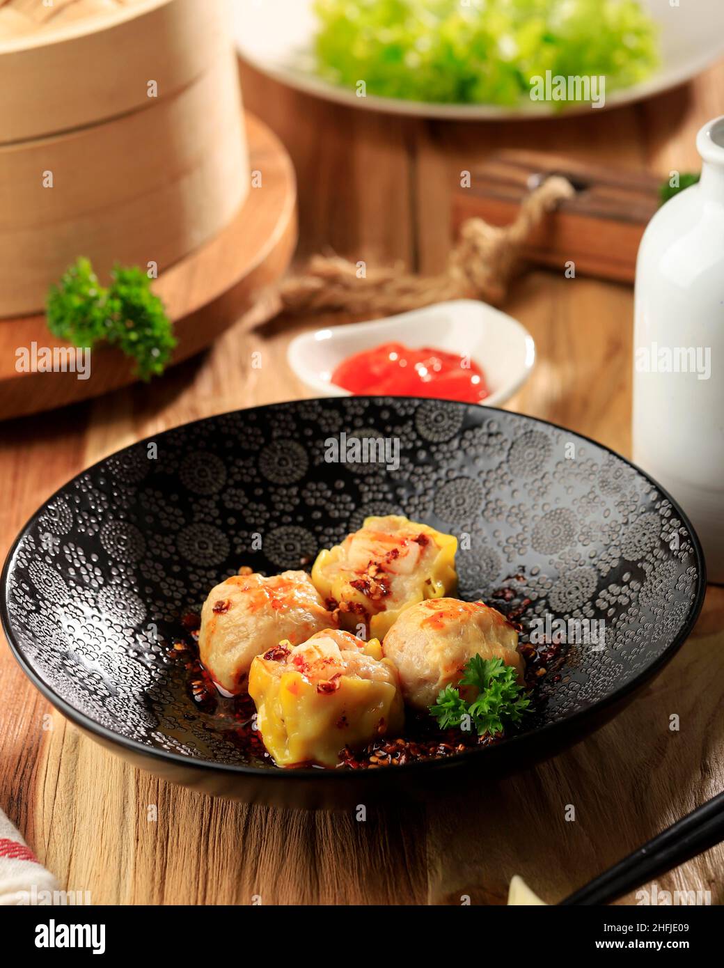Asian Shumai Dumpling with Red Chilli Oil, Sesame Seeds and Fresh ...