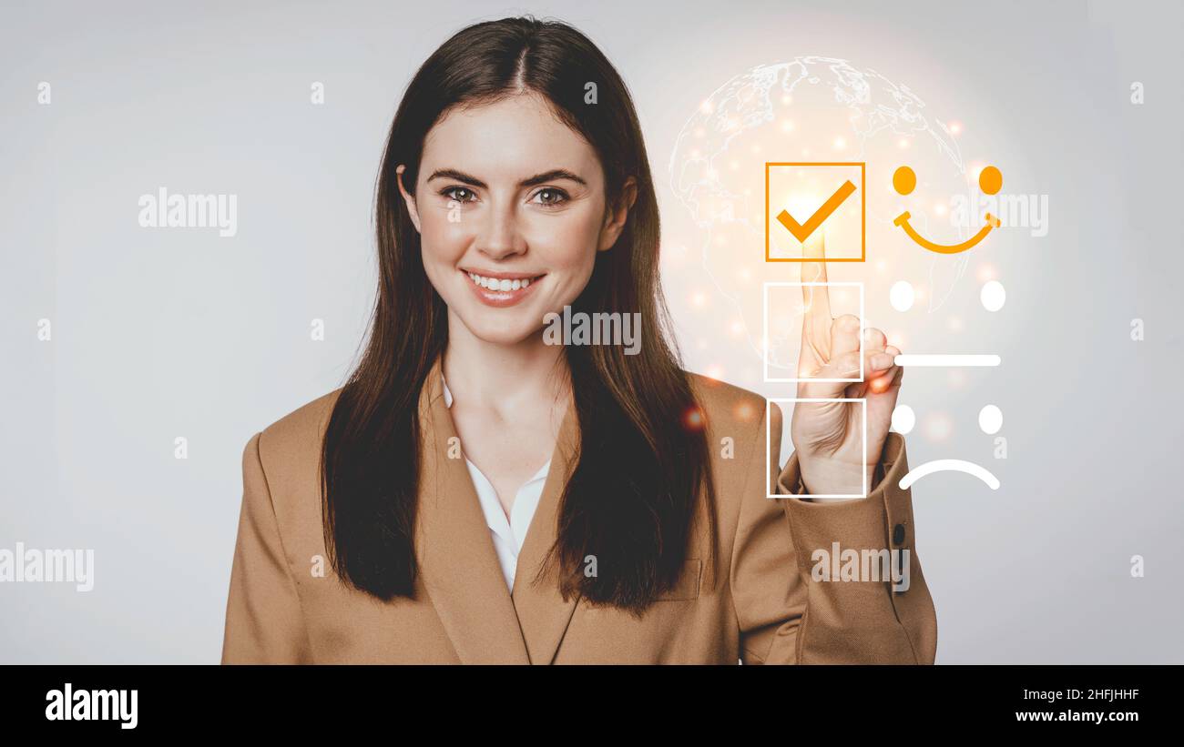 Young business woman checking on satisfaction checklist box.Copy space ...