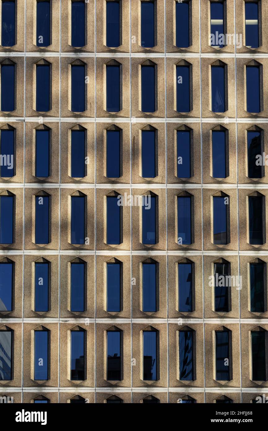 Building wall with windows and reflections in downtown Ottawa, Canada ...