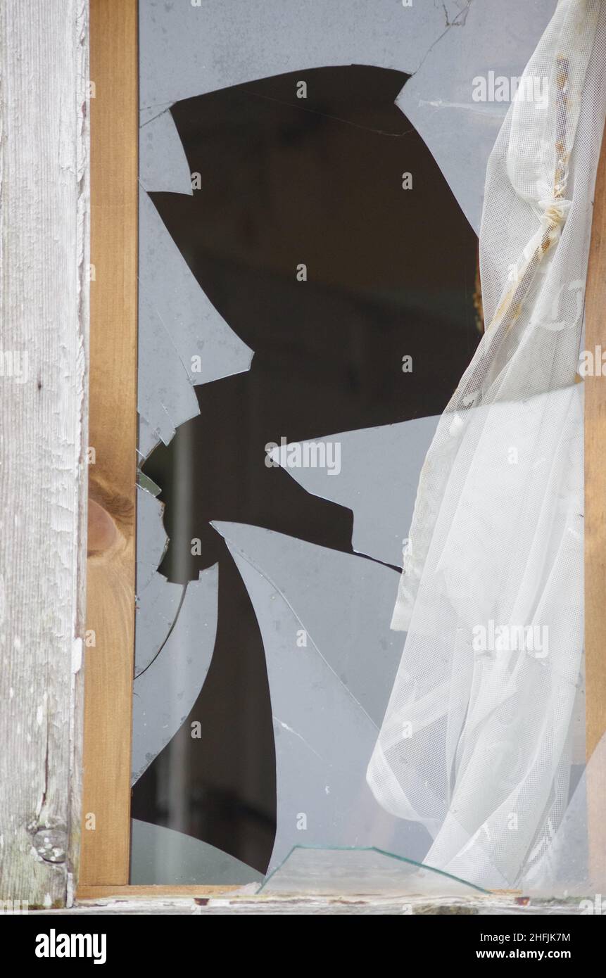 Broken window glass Stock Photo - Alamy