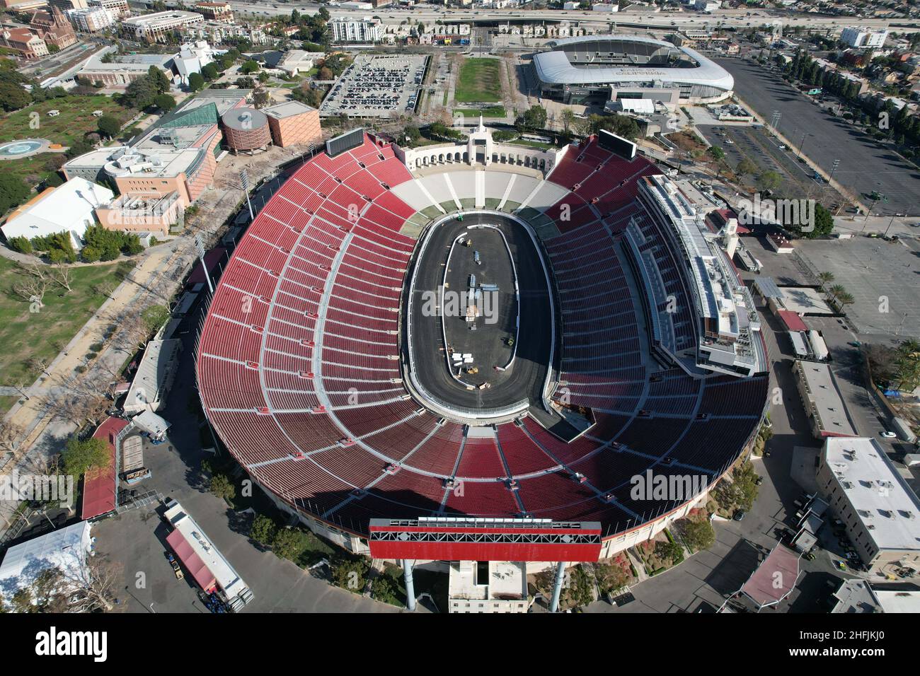 An aerial view of the construction of a temporary asphalt racetrack at the Los Angeles Memorial ...