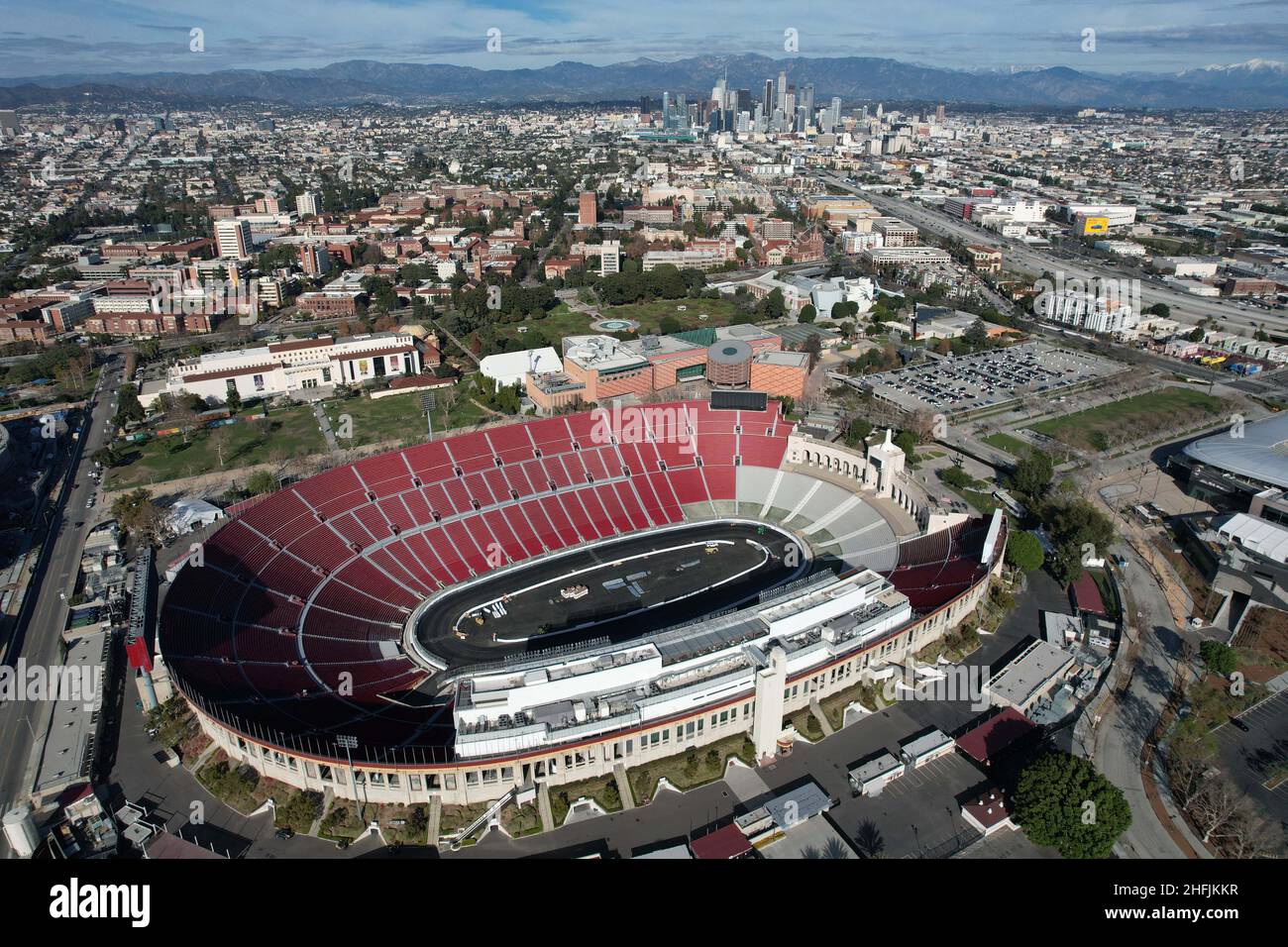 An aerial view of the construction of a temporary asphalt racetrack at the Los Angeles Memorial ...