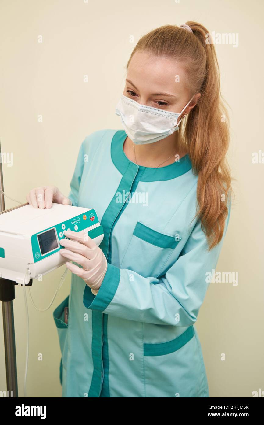 Portrait of young practitioner working in modern clinic Stock Photo - Alamy