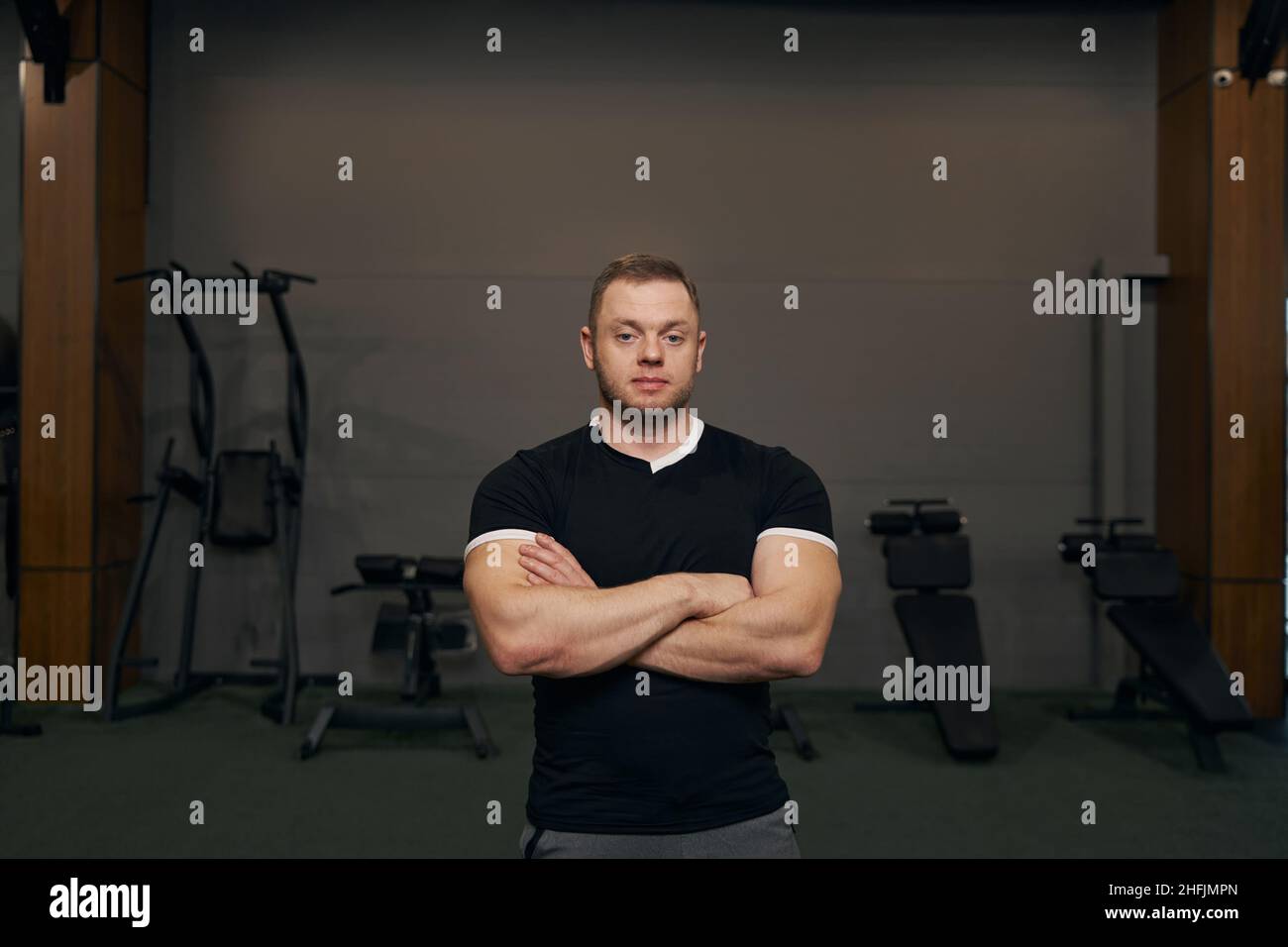 Serene male athlete posing hi-res stock photography and images - Alamy