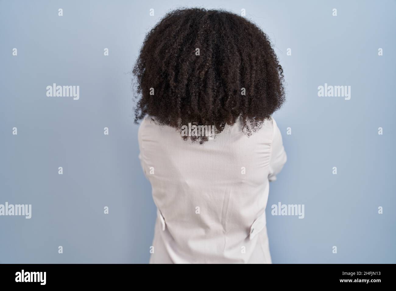 Young african american woman wearing doctor uniform and stethoscope ...