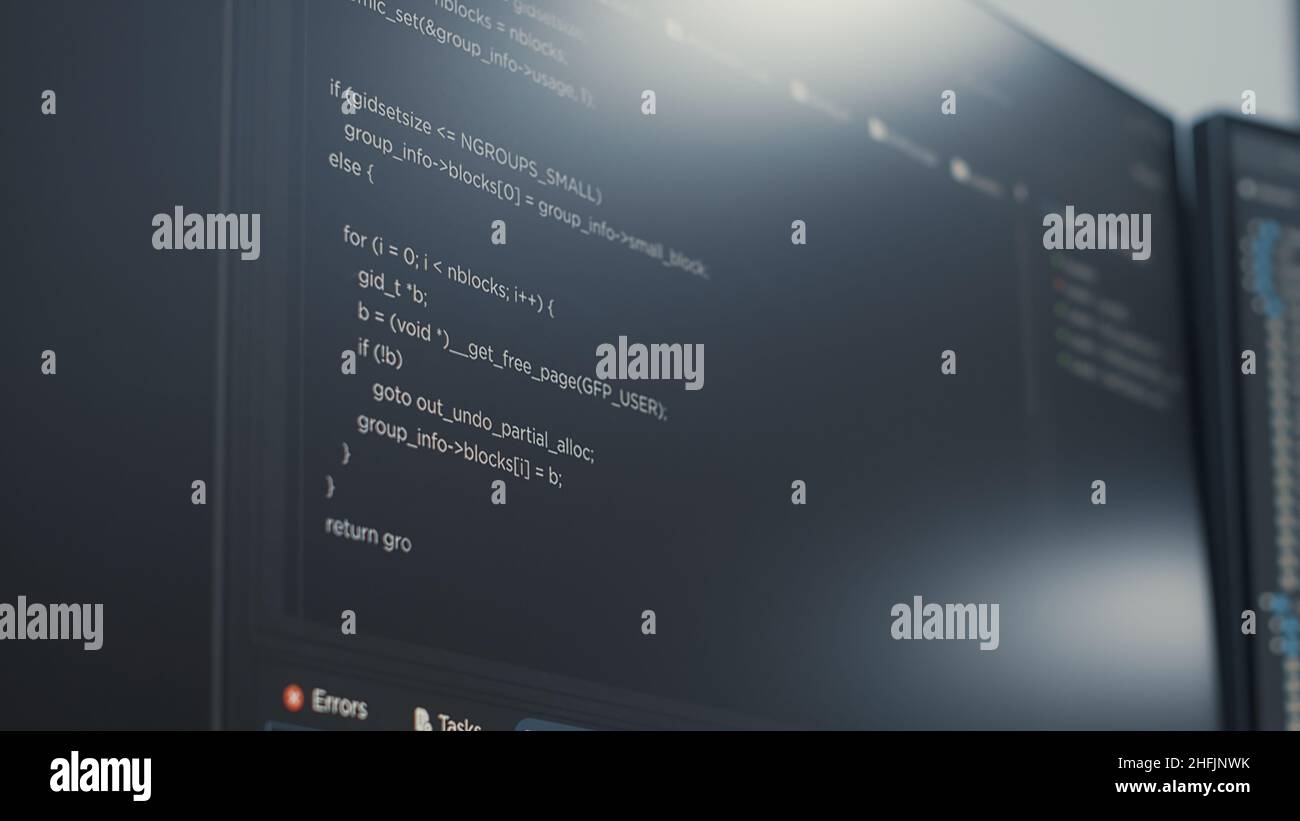 Closeup Of Computer Display Of Software Developer Typing Database Functions Script In It Startup