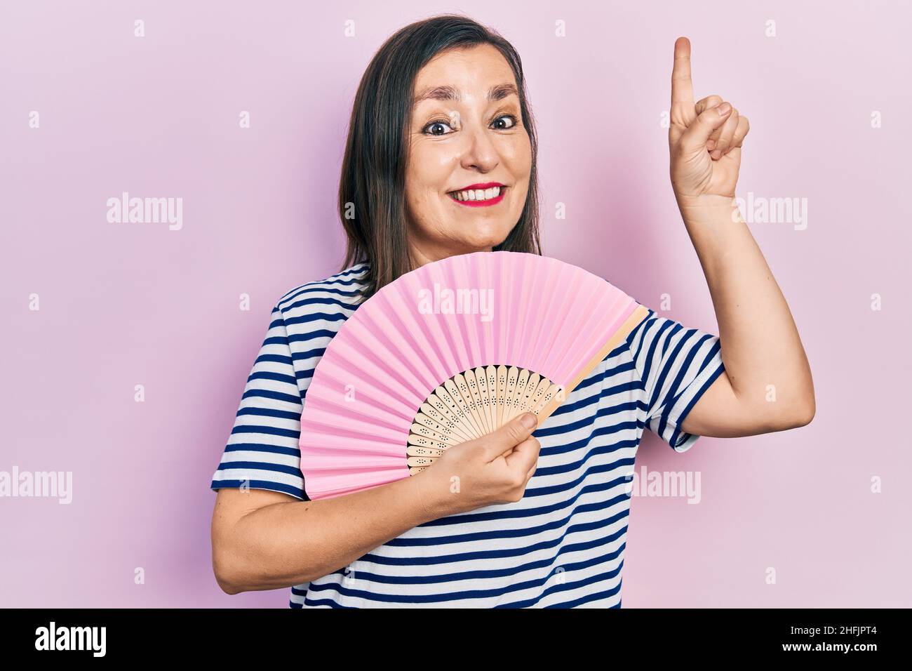 Mature woman waving funny hi-res stock photography and images - Alamy