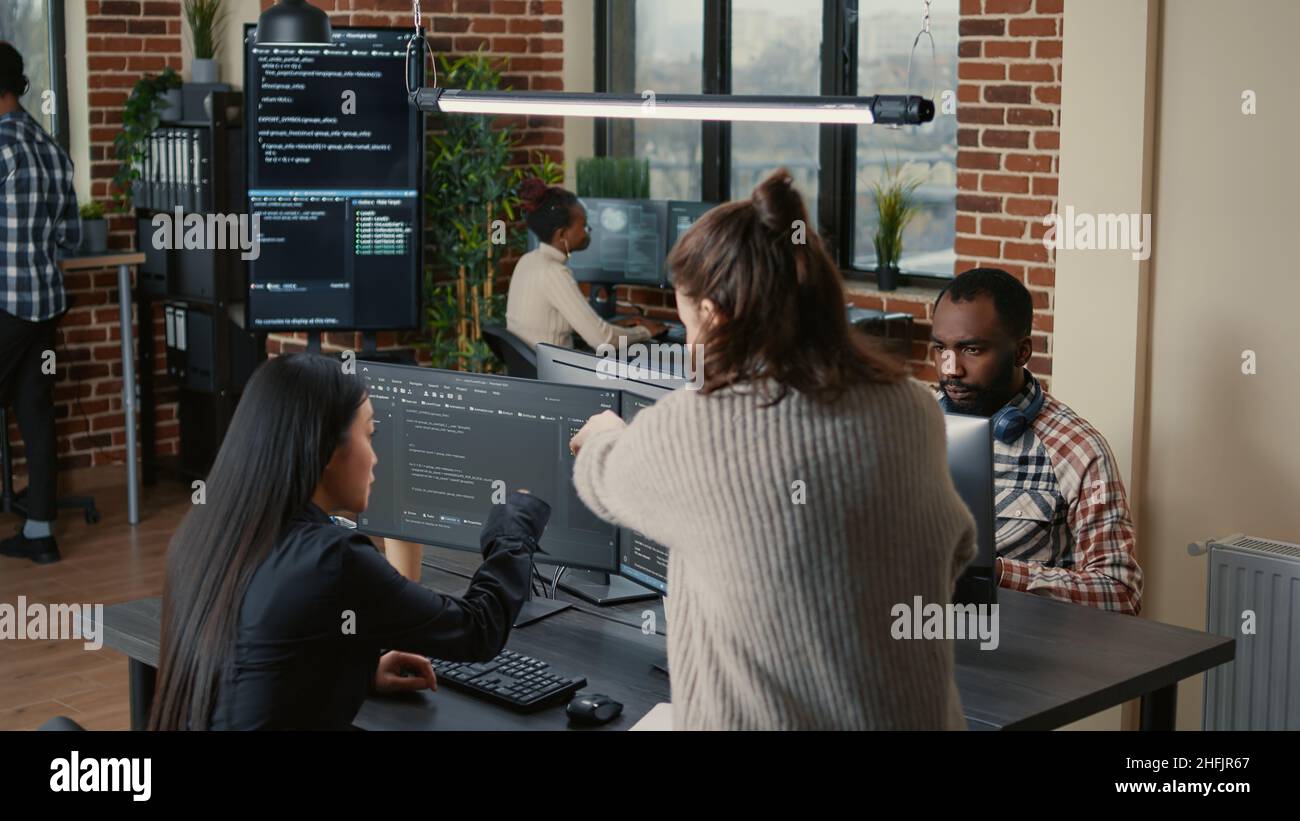 Software Programer Pointing Pencil At Source Code On Computer Screen Explaining Algorithm To