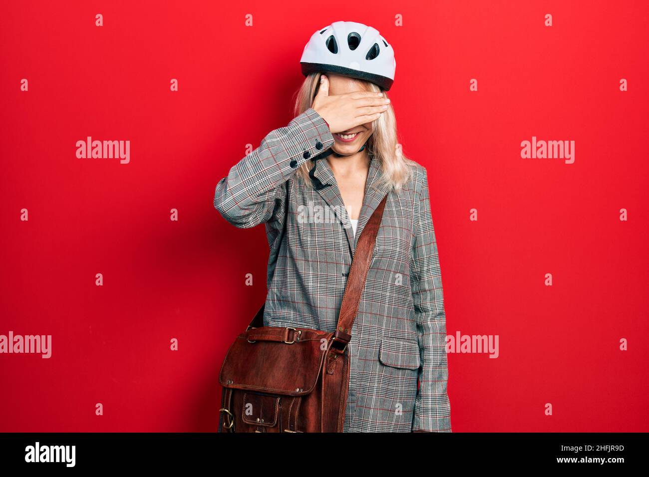 Beautiful Caucasian Blonde Business Woman Wearing Bike Helmet Smiling