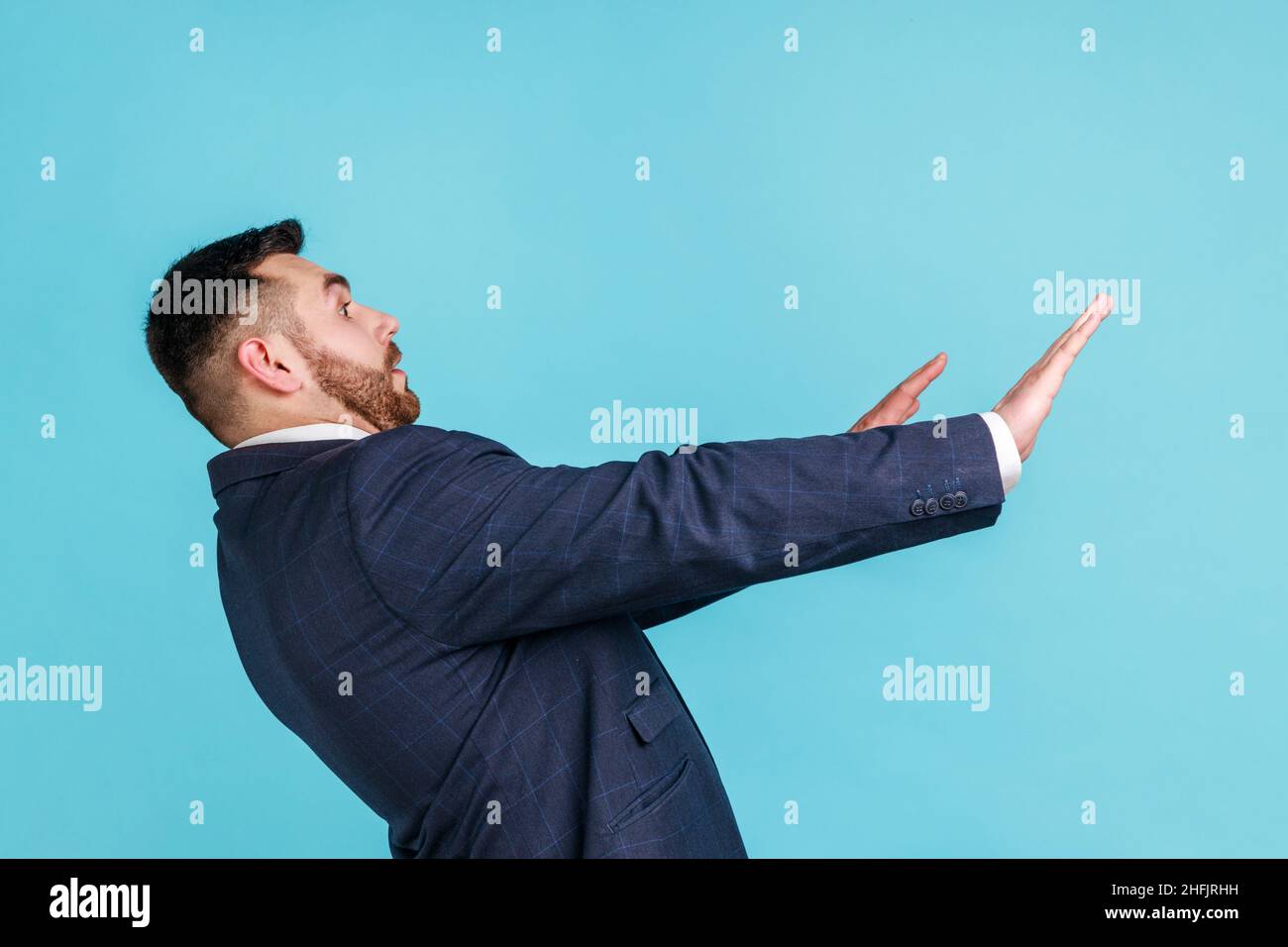 No, it's scary. Profile portrait of frightened shocked man in suit ...