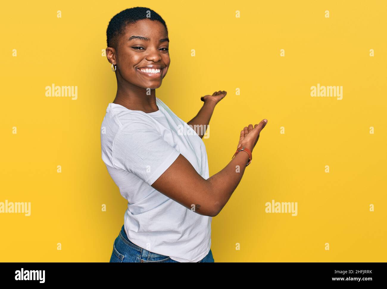 Young African American Woman Wearing Casual White T Shirt Inviting To