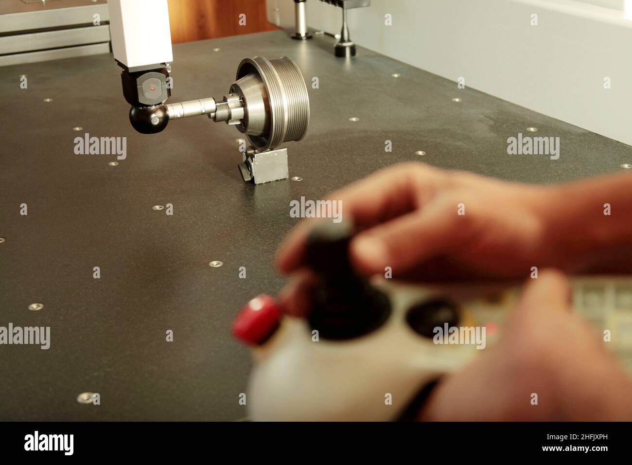 CMM probe measuring on steel cylinder. CMM probe Machine control ...