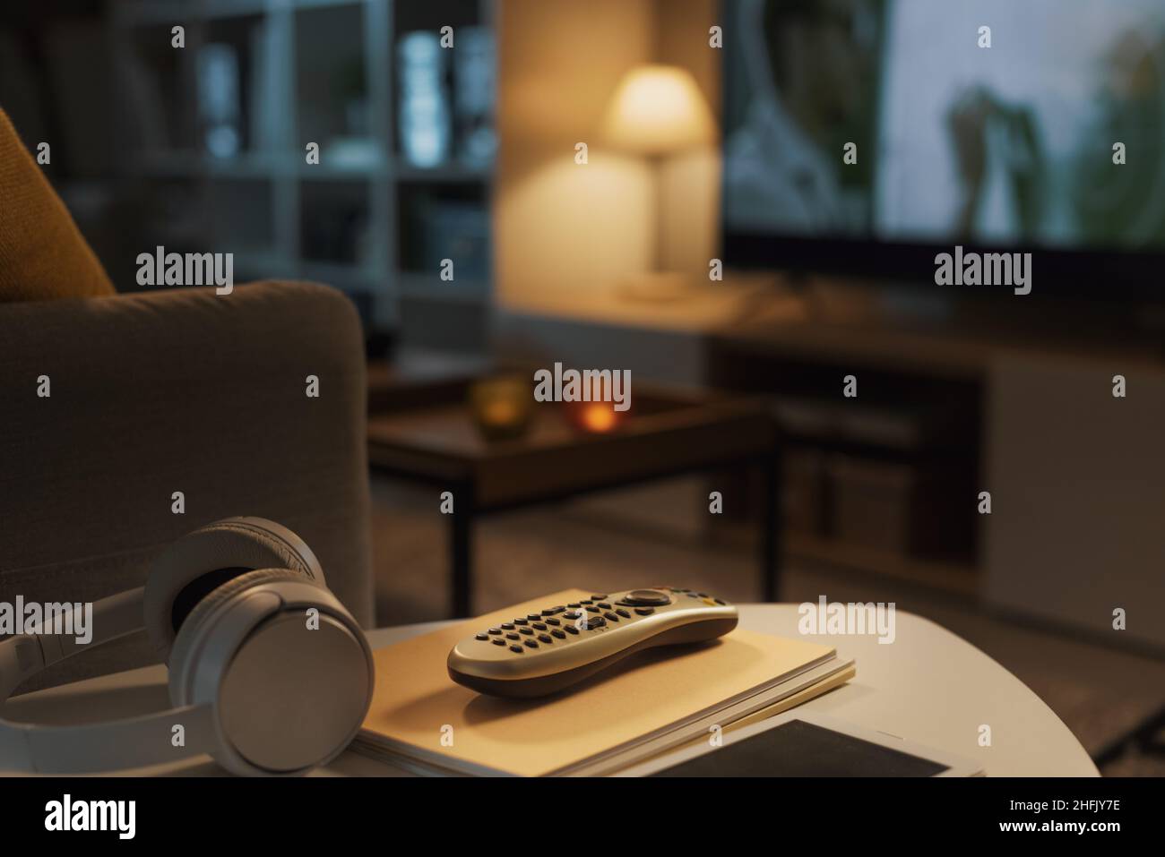 Modern living room interior with television screen in the background ...