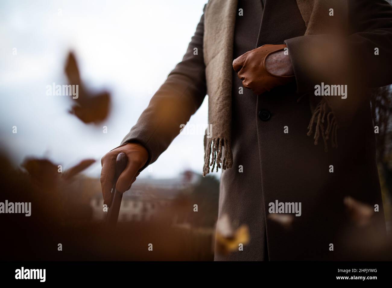 Hand with stick hi-res stock photography and images - Alamy
