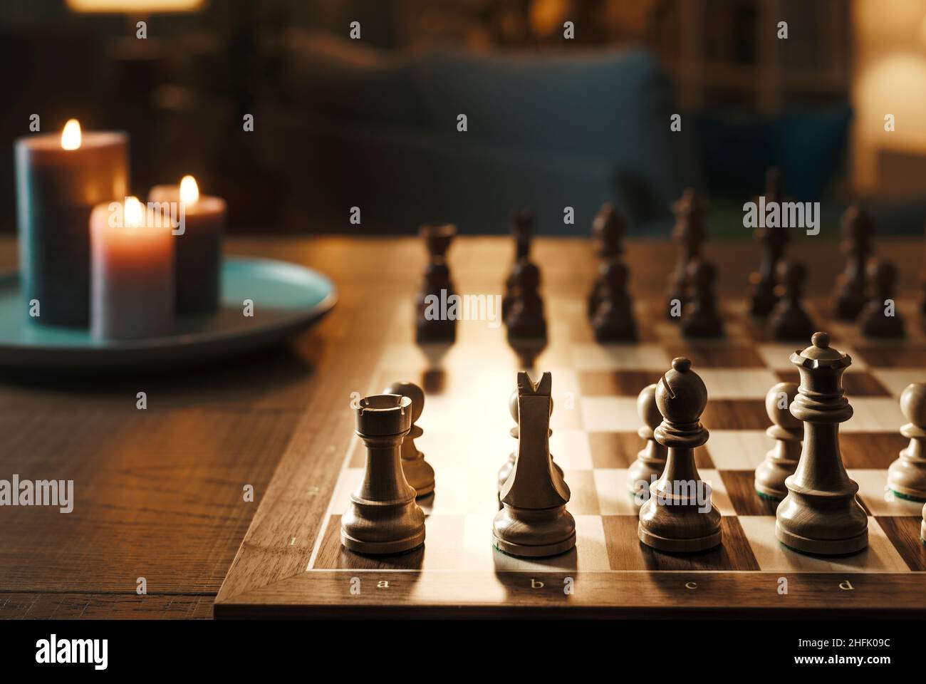Chess pieces arranged on the chessboard in the living room, board games ...
