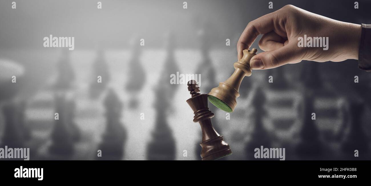 Hand chess player moving white hi-res stock photography and images - Alamy