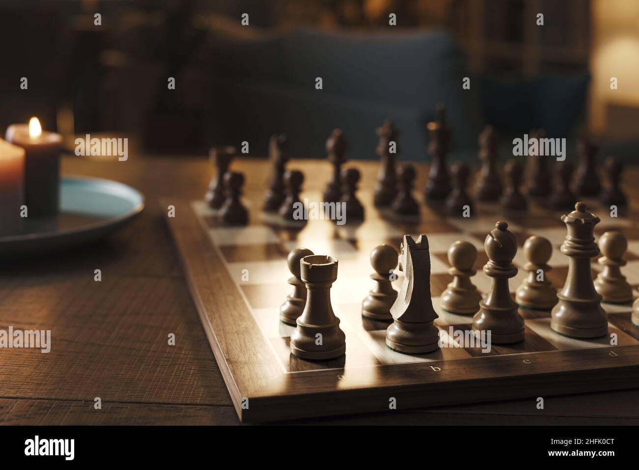 Chess pieces arranged on the chessboard in the living room, board games ...