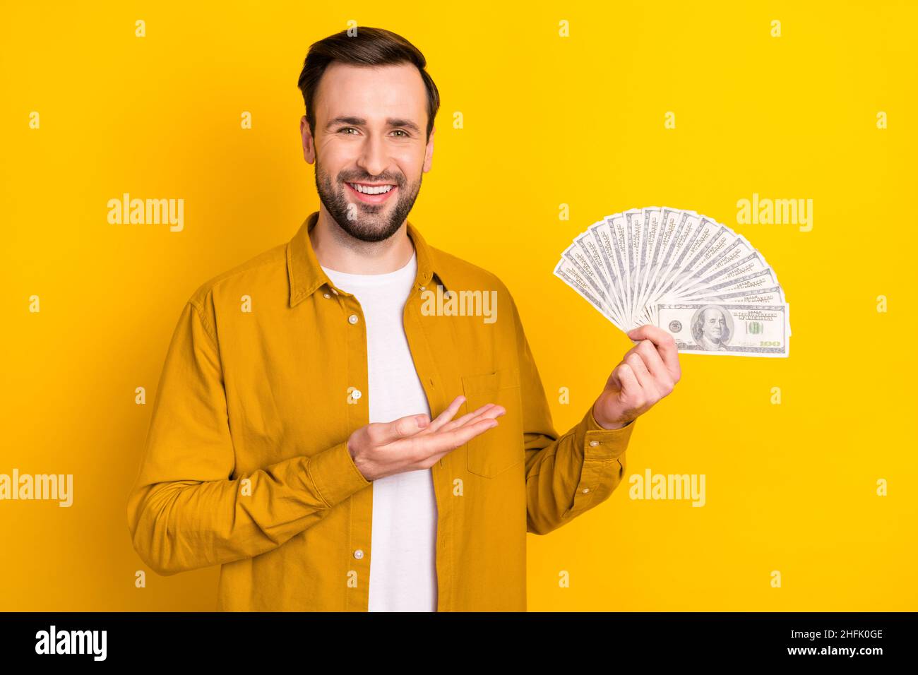 Photo of cheerful cute gentleman dressed casual outfit holding arm ...