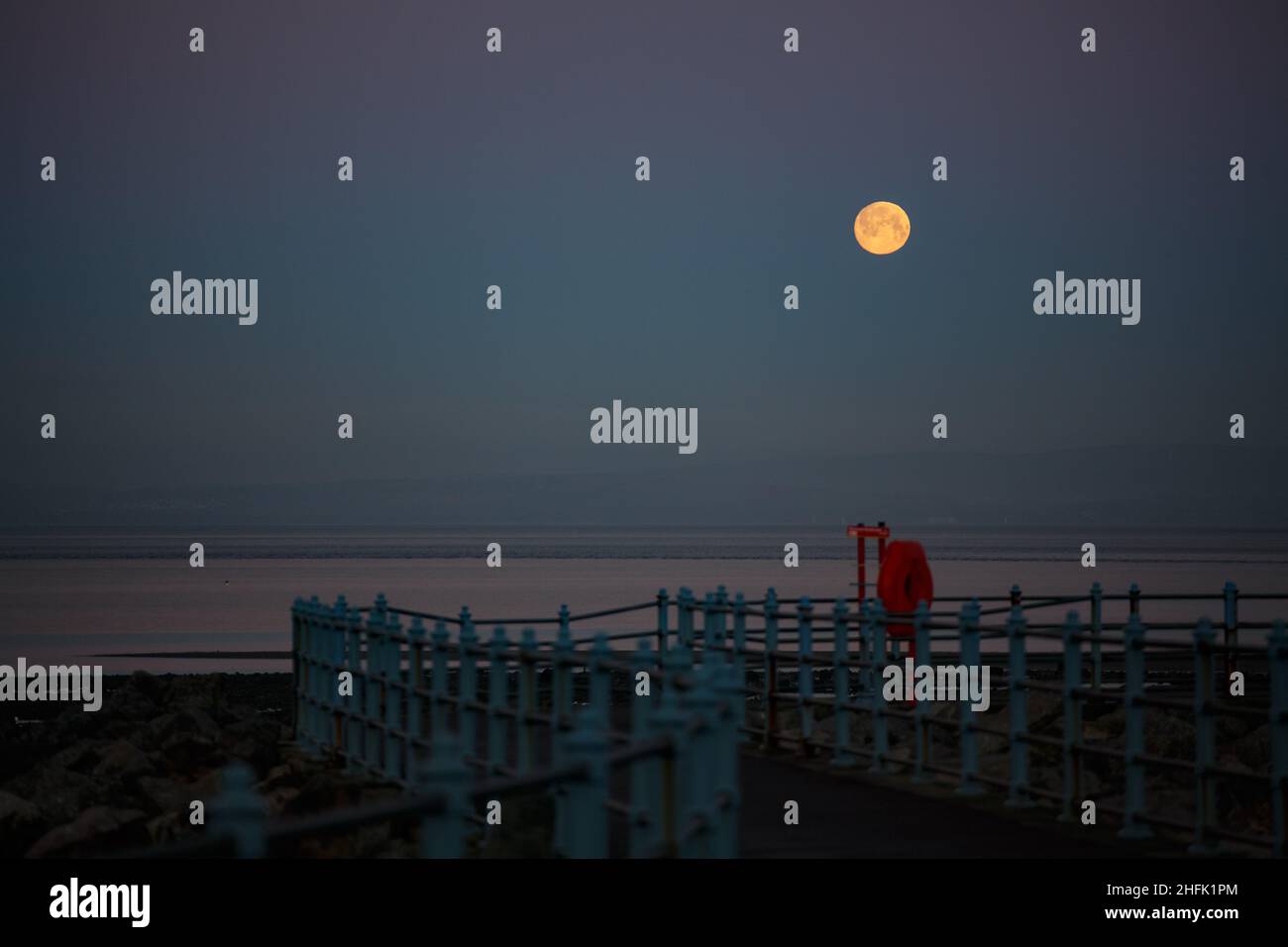 Morecambe Lancashire, United Kingdom. 17th Jan, 2022. Moonset across ...