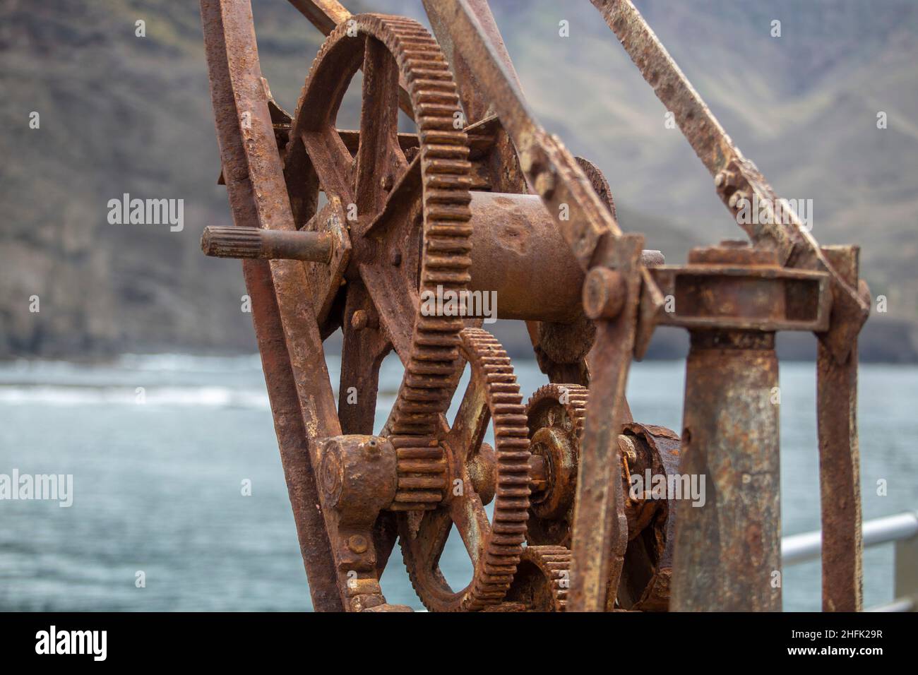 Details of a parts the moving parts of a rusty machine mechanical gear ...