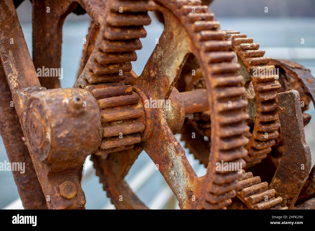 Details of a parts the moving parts of a rusty machine mechanical gear ...