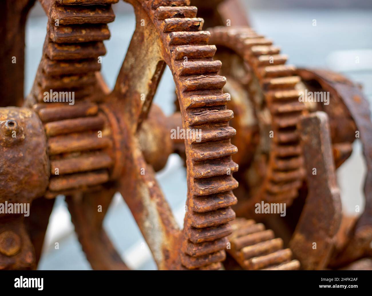 Details of a parts the moving parts of a rusty machine mechanical gear ...