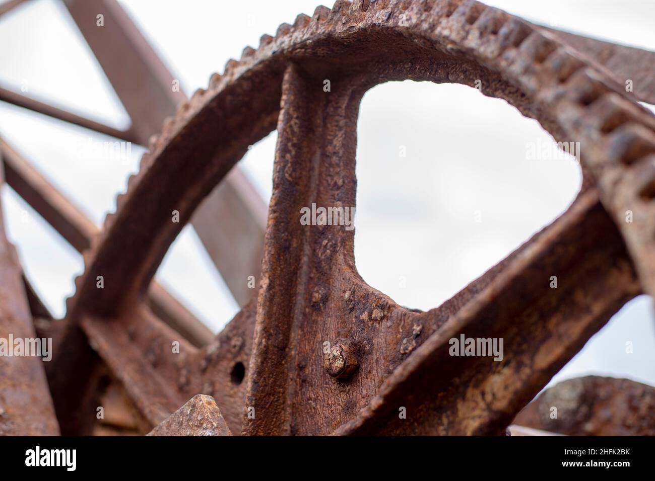 Details of a parts the moving parts of a rusty machine mechanical gear ...