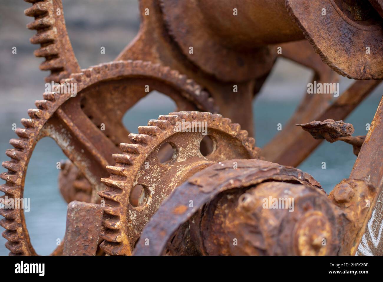 Details of a parts the moving parts of a rusty machine mechanical gear ...