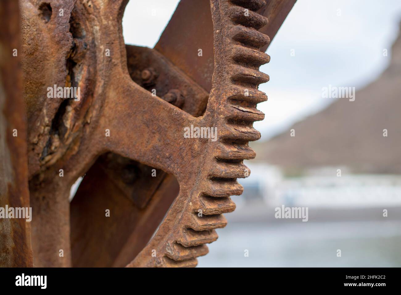 Details of a parts the moving parts of a rusty machine mechanical gear ...