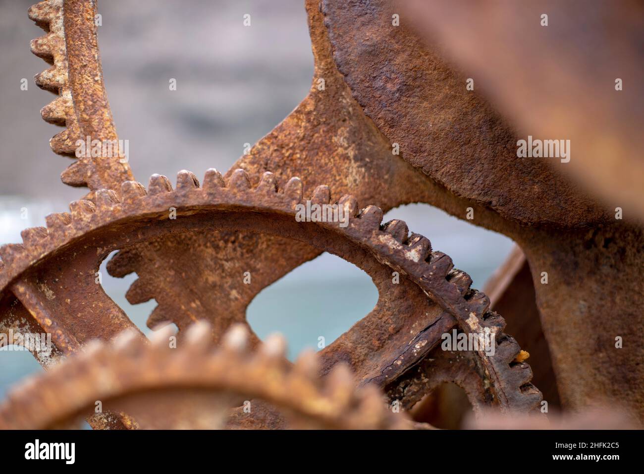 Details of a parts the moving parts of a rusty machine mechanical gear ...