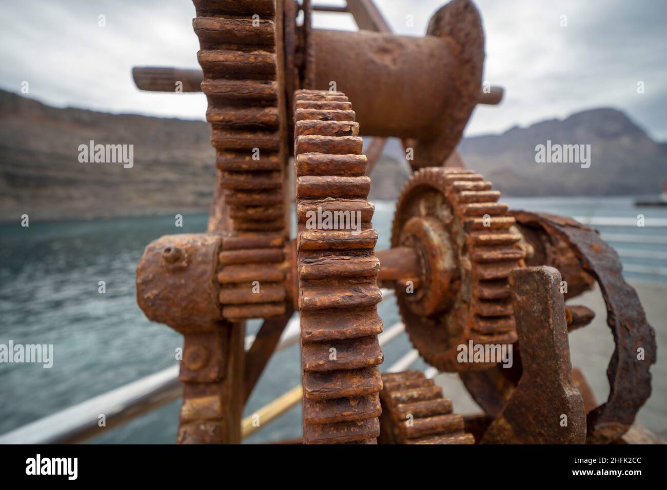 Details of a parts the moving parts of a rusty machine mechanical gear ...